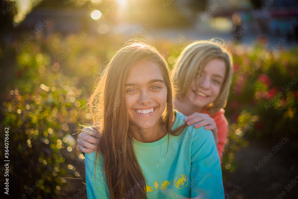 Two smiling girls. Two friends. Happy female students having fun ...