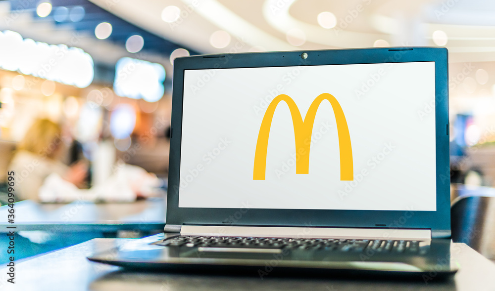Laptop computer displaying logo of McDonald's Stock Photo | Adobe Stock