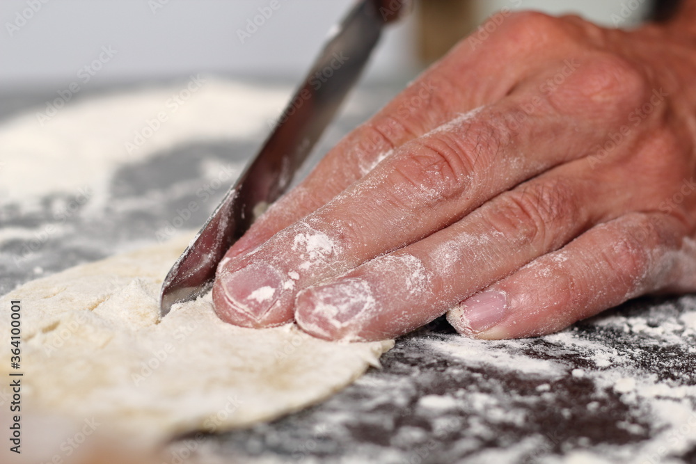 Cutting pastry trimmings into strips. Making Shoofly Tart Series. foto ...