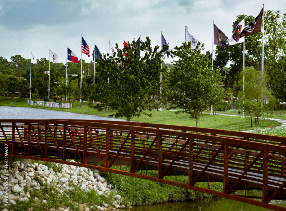 pedestrian bridge to Historic Flag Park in Conroe, TX Stock Photo ...