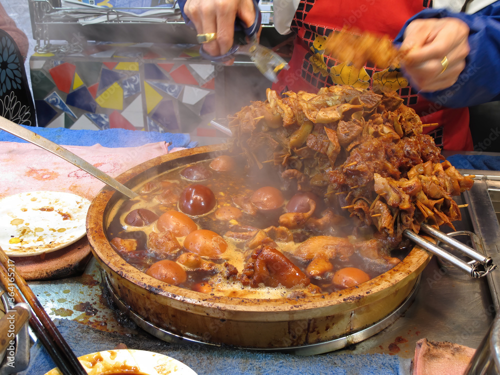 Traditional street vendor selling Pork knuckles and ginger stew Stock ...