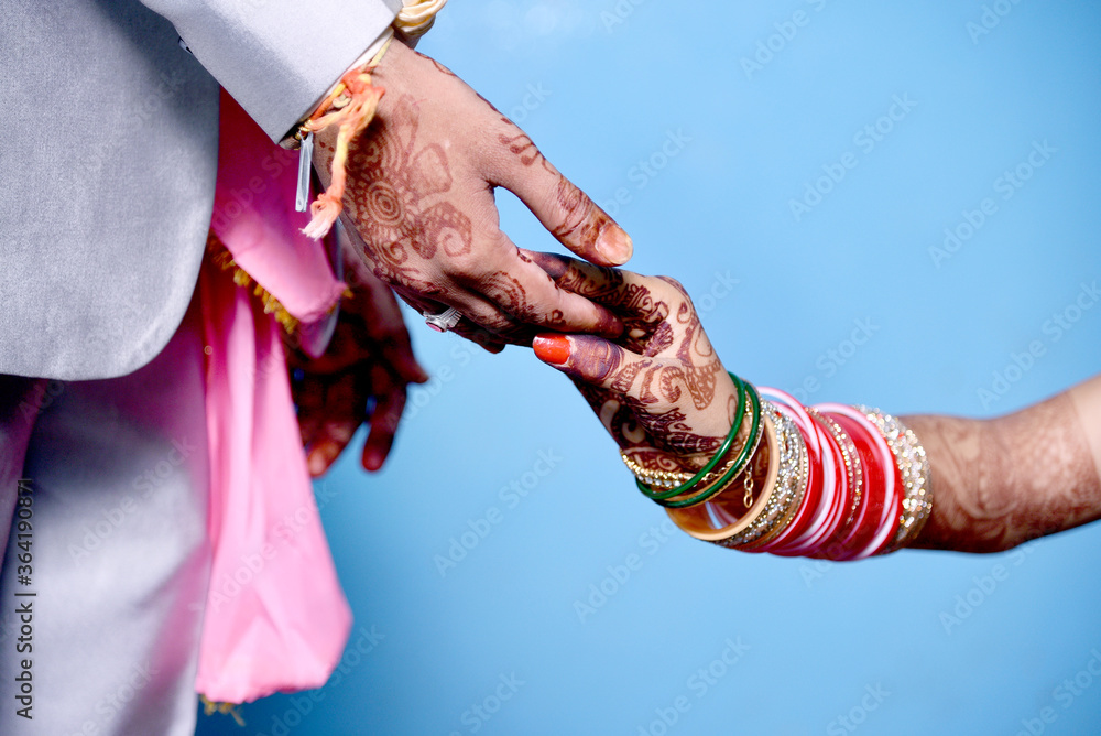 Bride & Groom Hand's Together in Indian Wedding Stock Photo | Adobe Stock
