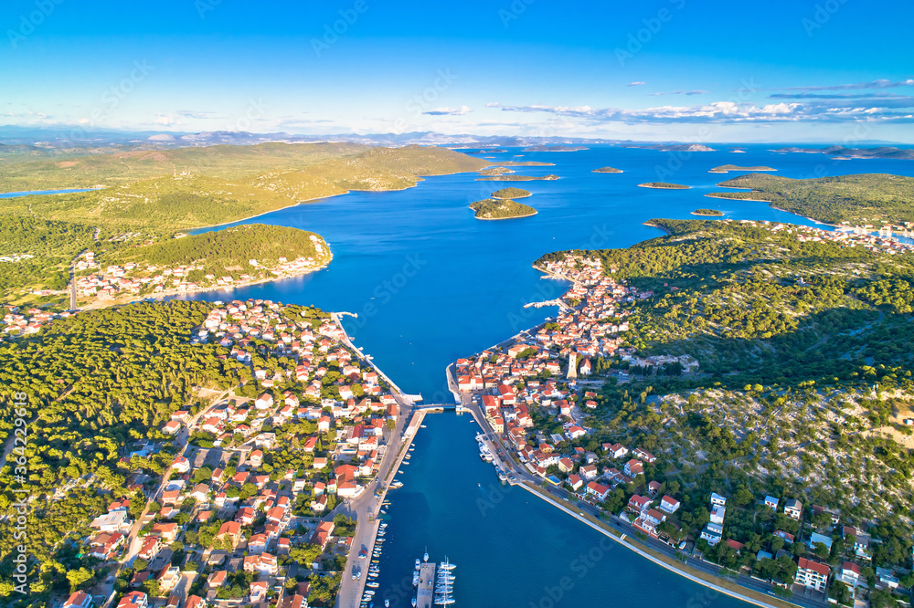Coastal town of Tisno aerial panoramic view, bridge to island of Murter ...
