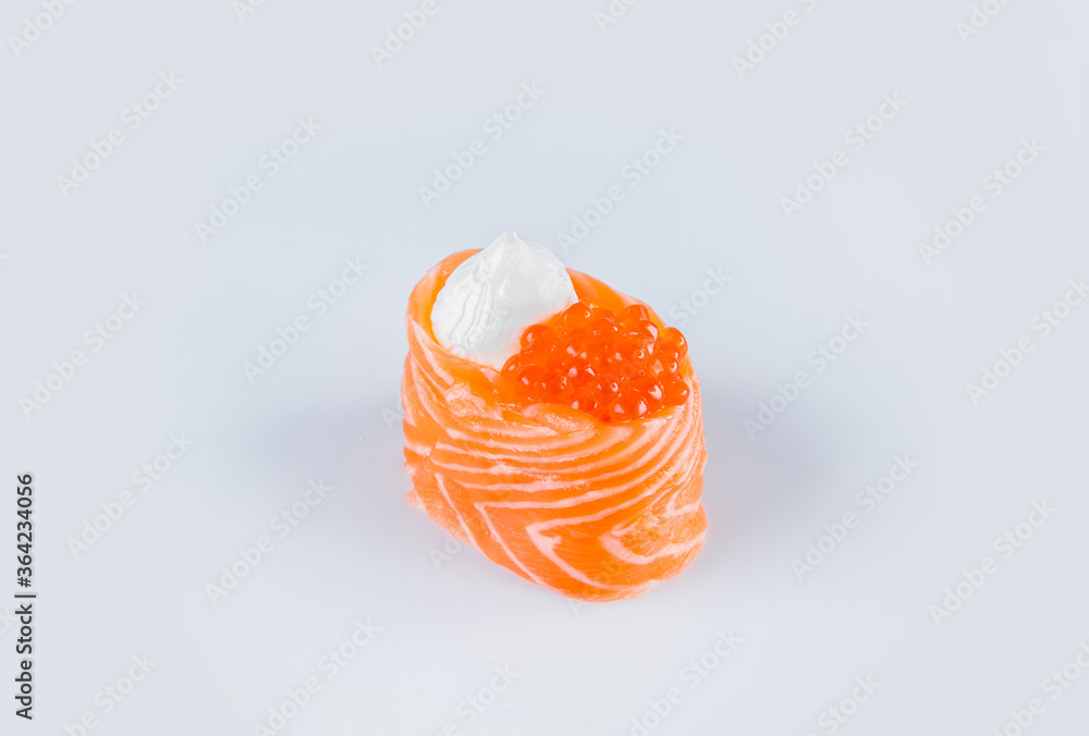 Japanese Gunkan Sushi with salmon caviar (Sake Ikura) and Philadelphia cheese. Gunkan-poppy with ...