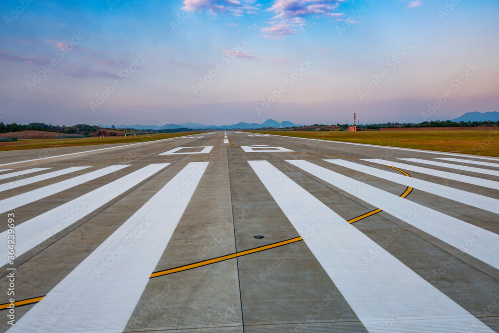Runway, airstrip in the airport terminal with marking on blue sky with ...