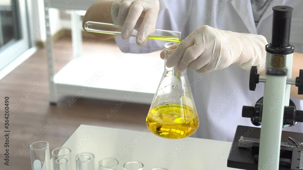 Stockvideo scientist wearing personal protective equipment or ppe ...