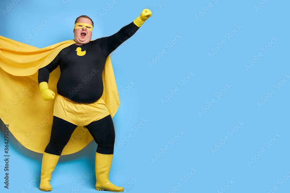 Foto de fantastic fat superhero man is defender of universe, ready to ...