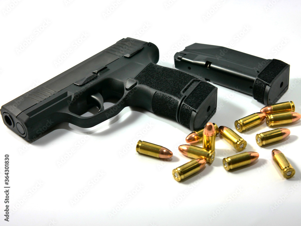 Short guns and ammunition placed on white background.Guns and ...