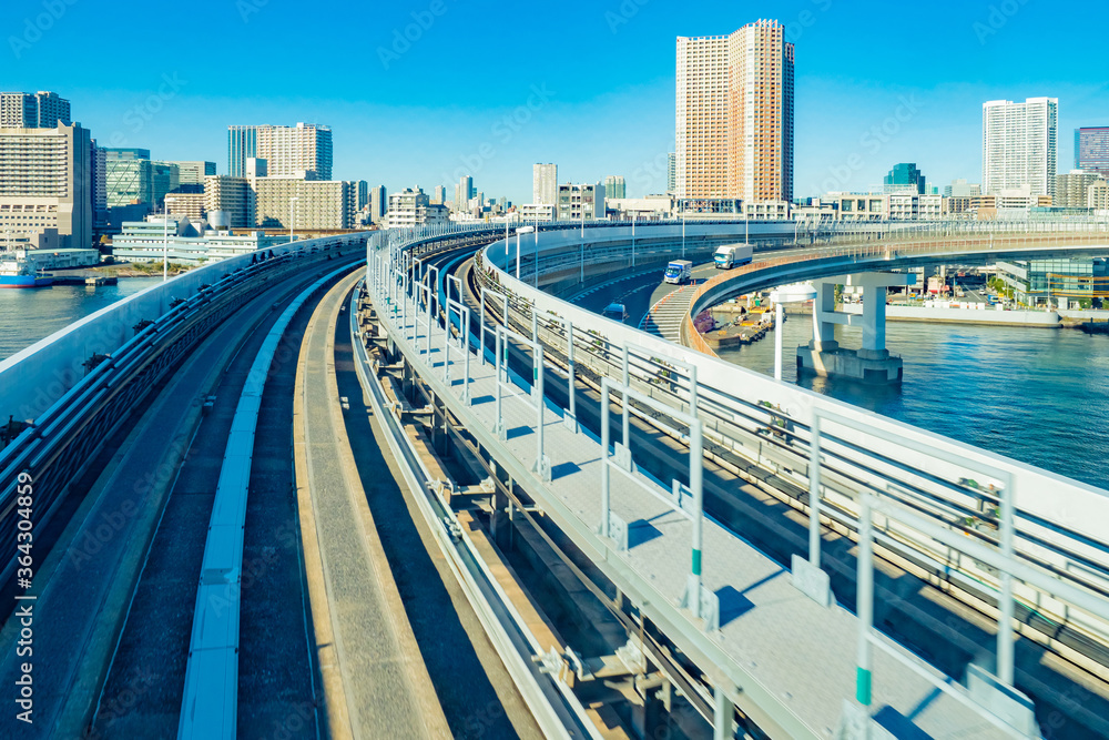 Japan. Bridge leading to the island of Odaiba. Rainbow bridge close-up ...
