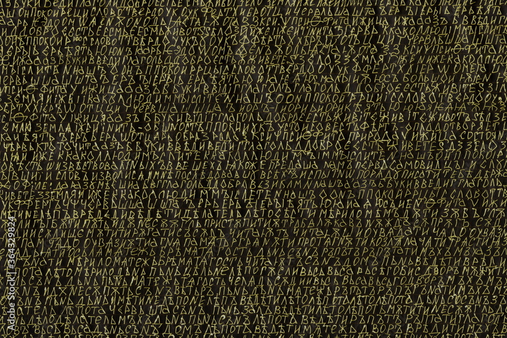 Grunge texture of handwritten text in old Slavonic on a black ...