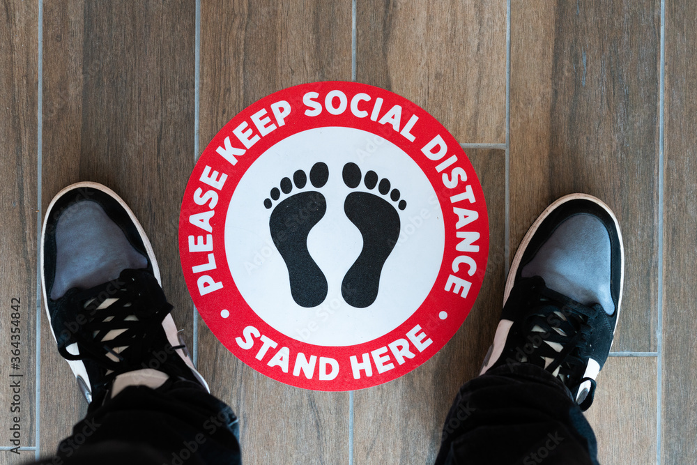 Please keep social distance spacing sign / sticker on floor with feet ...