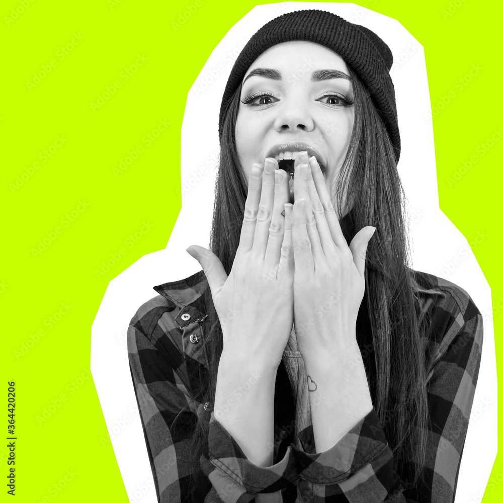 Excited surprised young woman covers hands open mouth over yellow ...