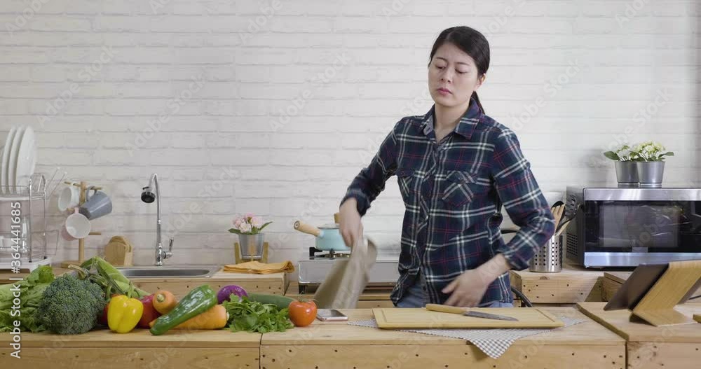 slow motion angry asian woman throwing with take off apron and running ...