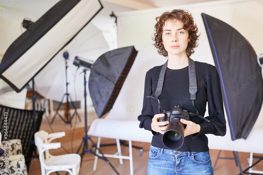 Professional photographer with SLR camera Stock Photo | Adobe Stock