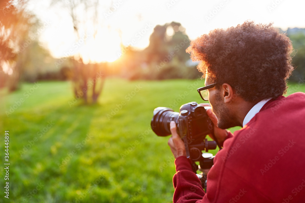 Photographer as a landscape photographer taking pictures Stock Photo ...