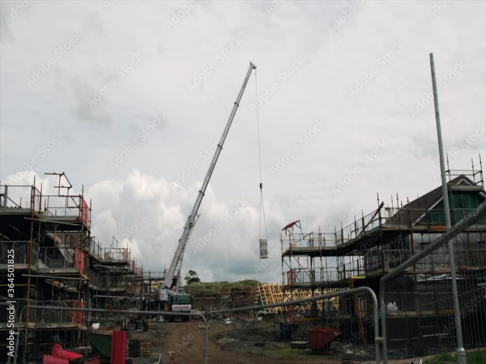 Construction site back working after Covid-19 lockdown with a crane ...