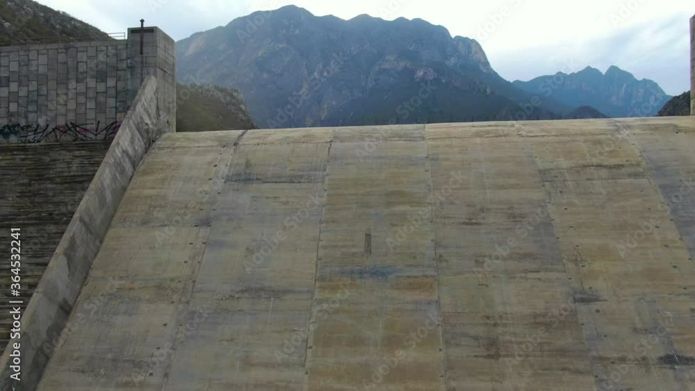 Cement dam of hydro-power plant built on beautiful valley of La ...