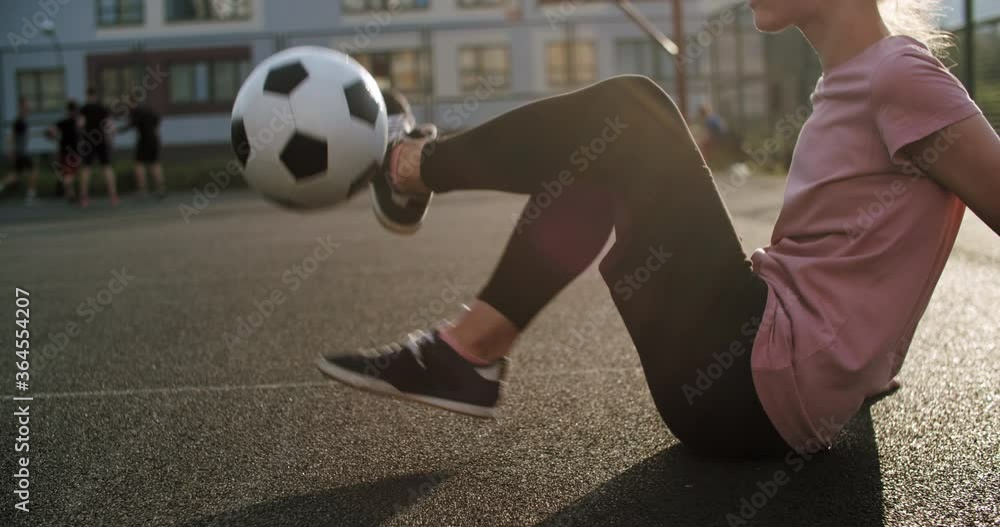 Girl practicing soccer skills and tricks Stock Video | Adobe Stock