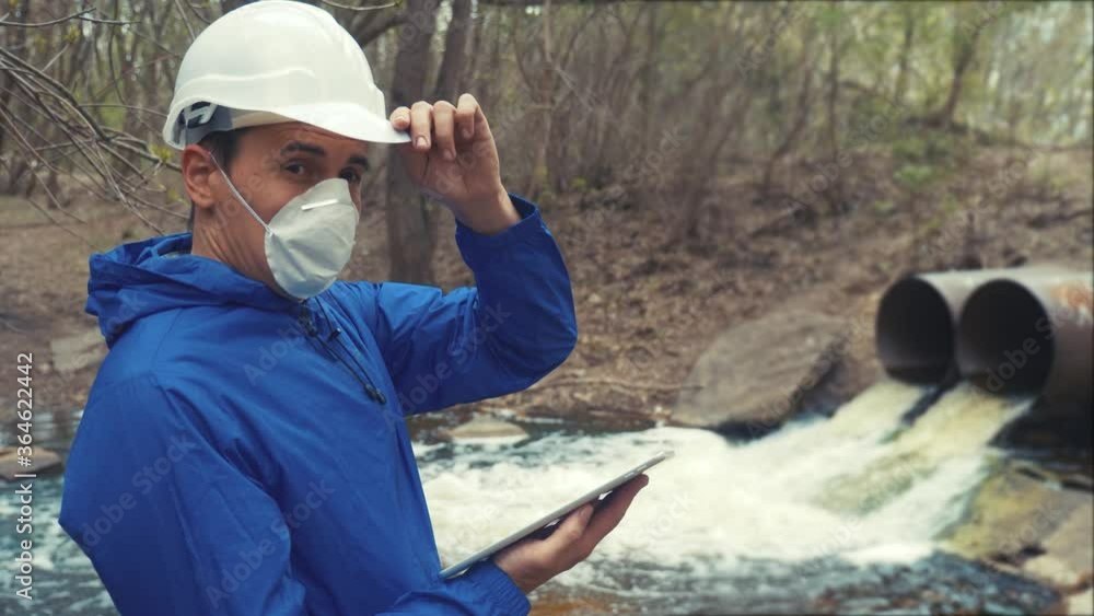 environmental pollution radiation waste concept . man chemist scientist ...