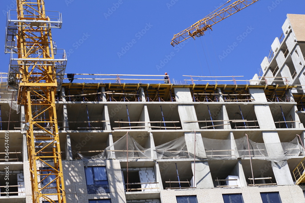 The construction of a new multi-storey building. Construction of a new ...