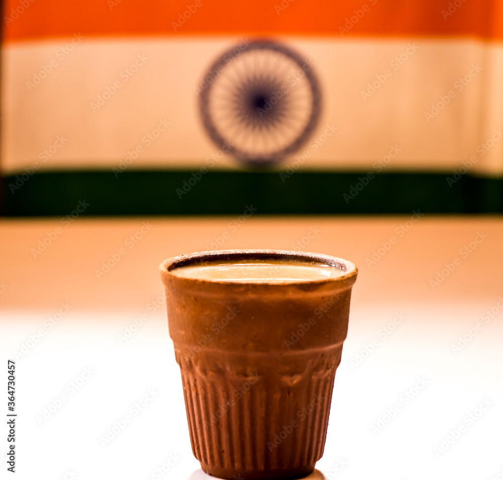Image of indian Tea in traditional cup with indian flag in its ...