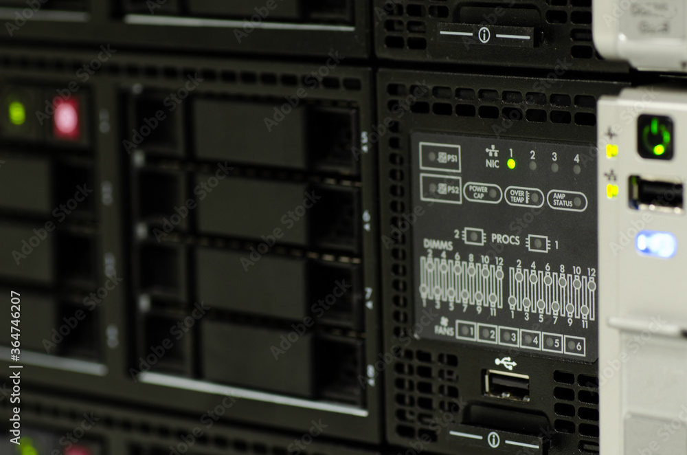closeup server rack cluster in the datacenter. Stock Photo | Adobe Stock
