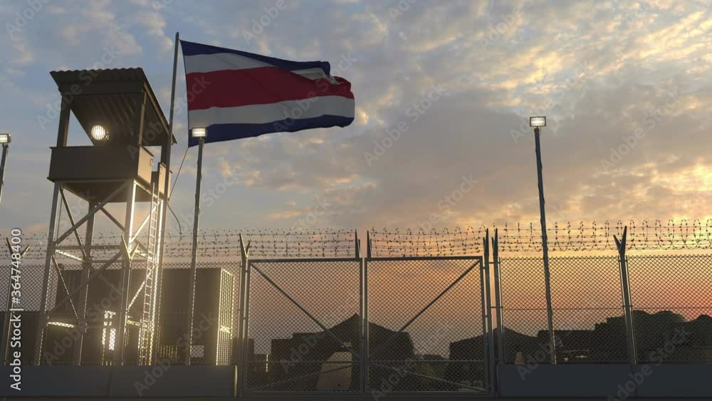 National flag of Costa rica above military base at sunset Stock Video ...