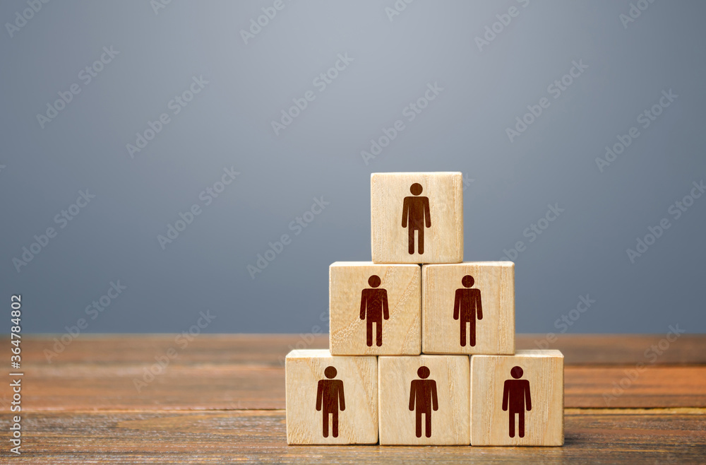 Blocks pyramid with people. Joint efforts to achieve goal. Teamwork ...