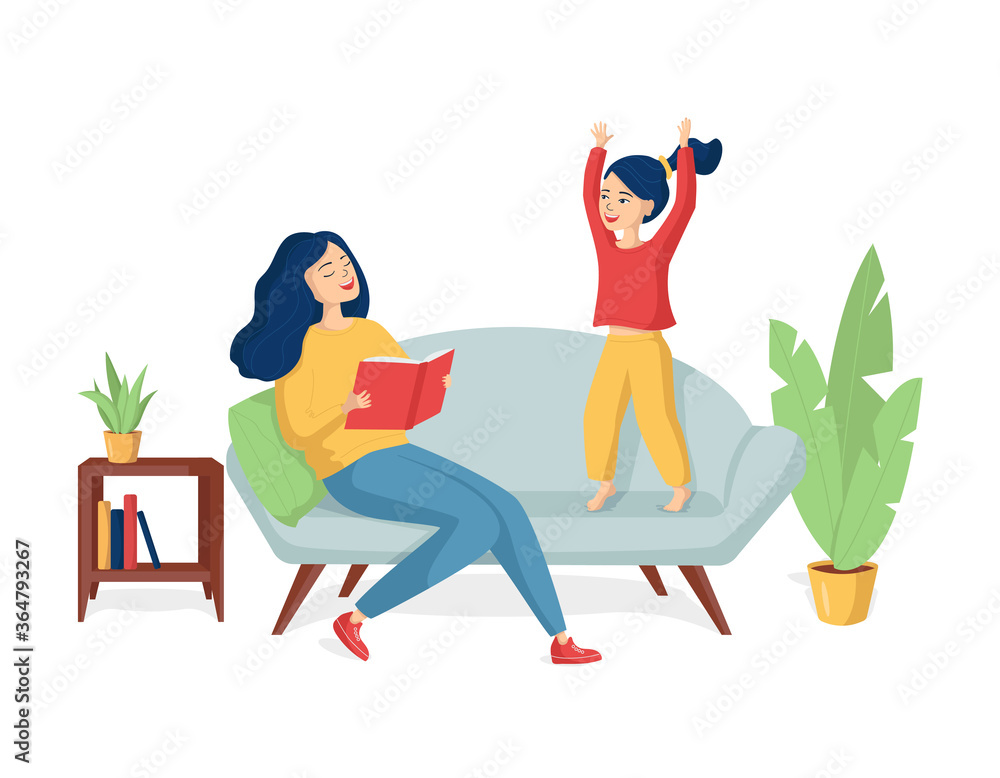 Happy laughing mom is reading a book to daughter. The cheerful child ...