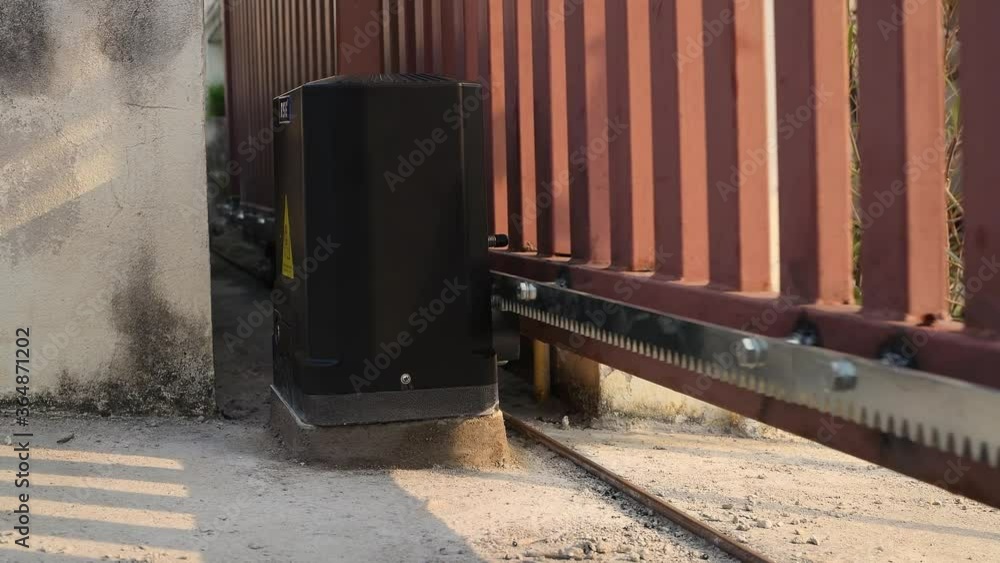 Technician installed and test automatic gate motor system working for ...