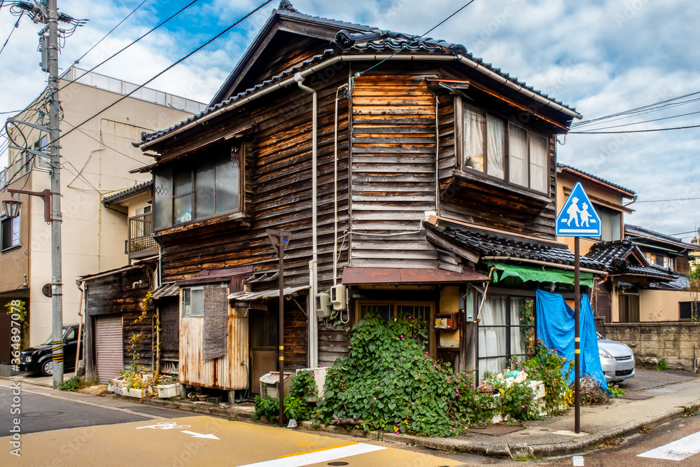 Old, wooden abandoned ghost house in Kanazawa, Japan with japanese ...