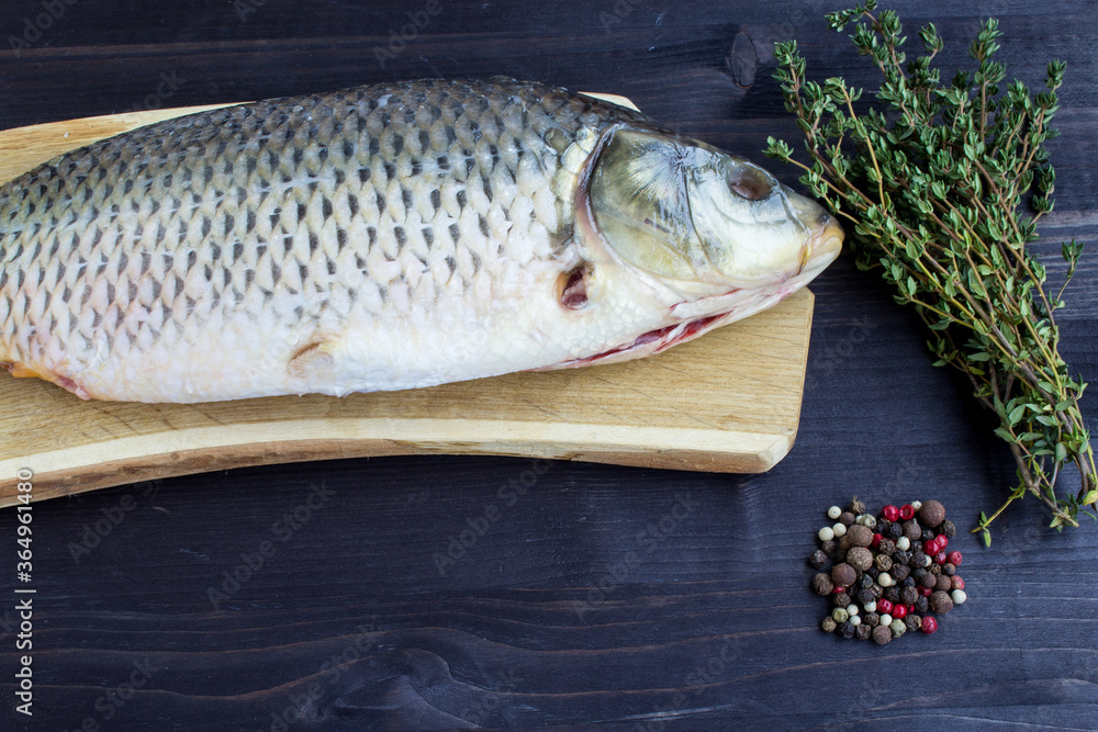 Step 1. Raw carp and spices. Products for the preparation of baked carp ...