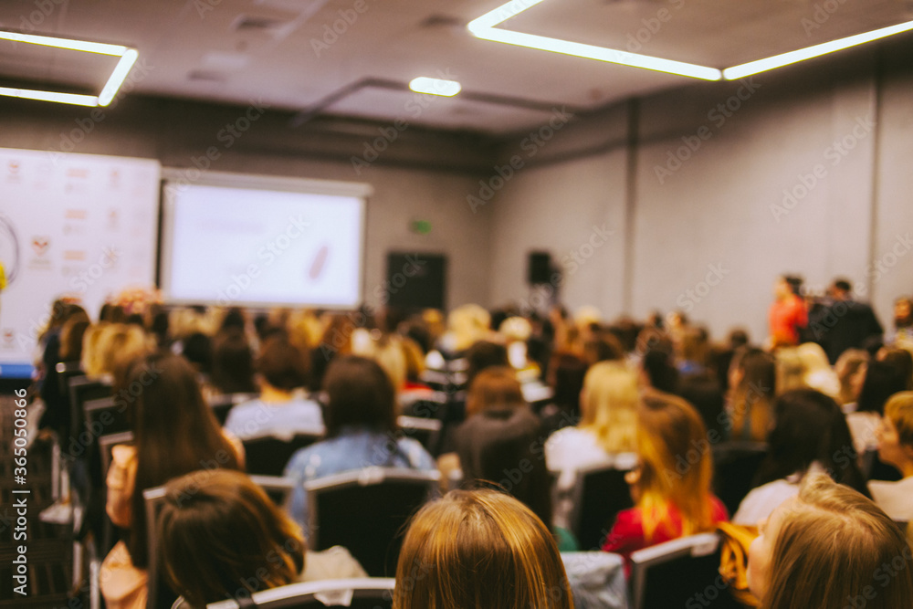 conference. people in the conference room. speech speaker in front of ...