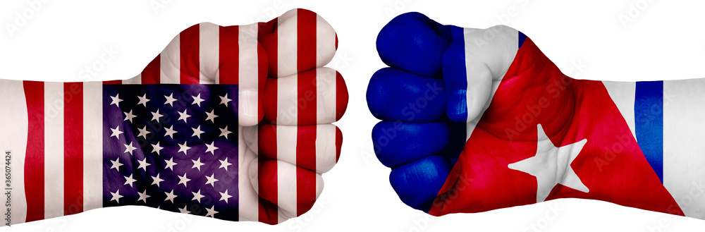 Two hands are clenched into fists and are located opposite each other ...