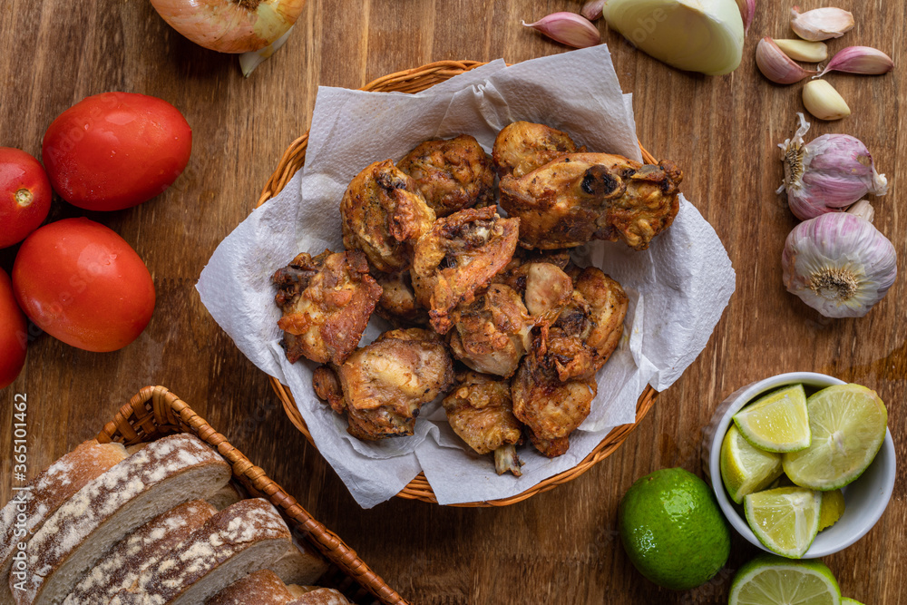 Brazilian style deep fried chicken and Sliced white bread. Called ...