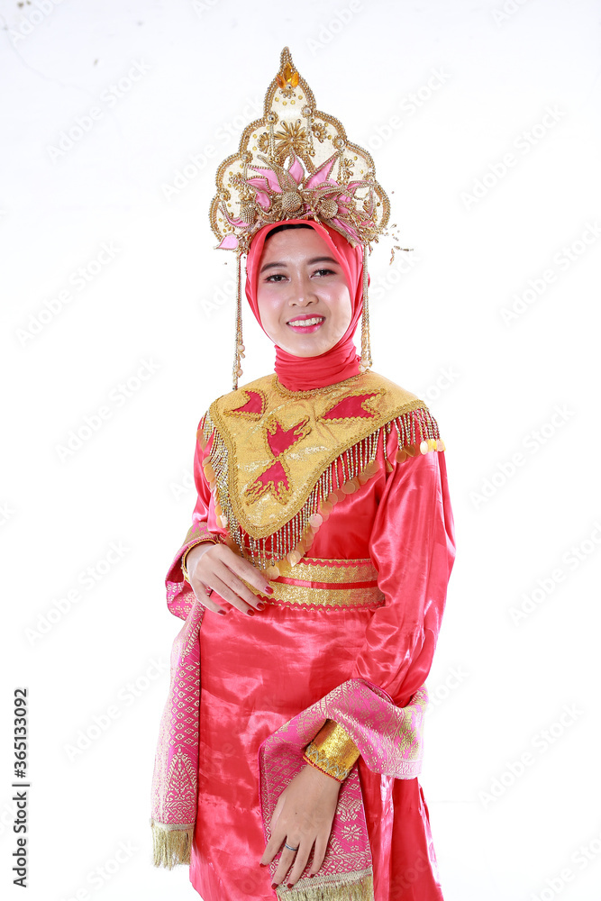 Beautiful smiling Asian girl wearing a set of modern traditional ...