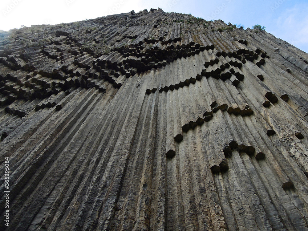 View bottom up on the polygonal structure of the basalt columns in the ...