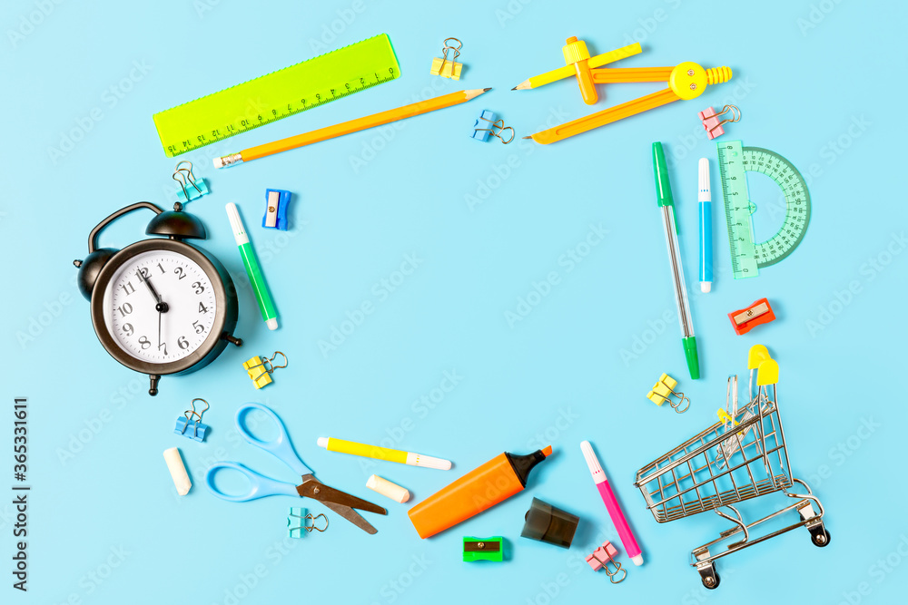 Frame from school stationery on a blue background. Concept back to ...