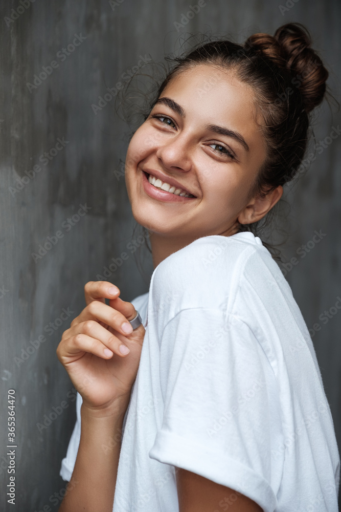 Stockfoto Beautiful girl smiling cute shyly. Close-up portrait of a ...