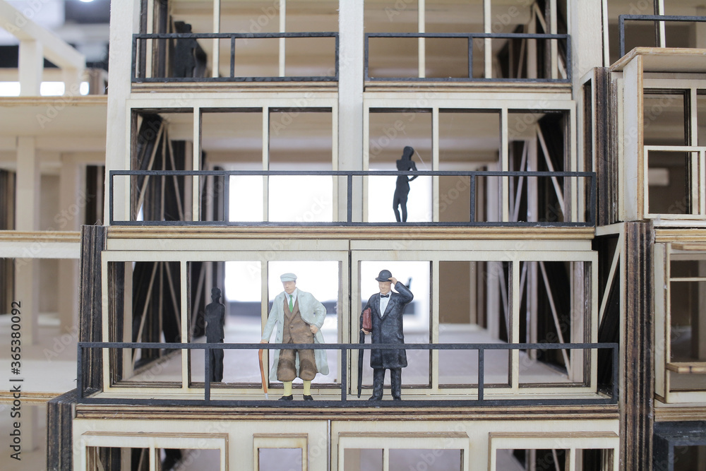 the Miniature construction workers building plans Stock Photo | Adobe Stock