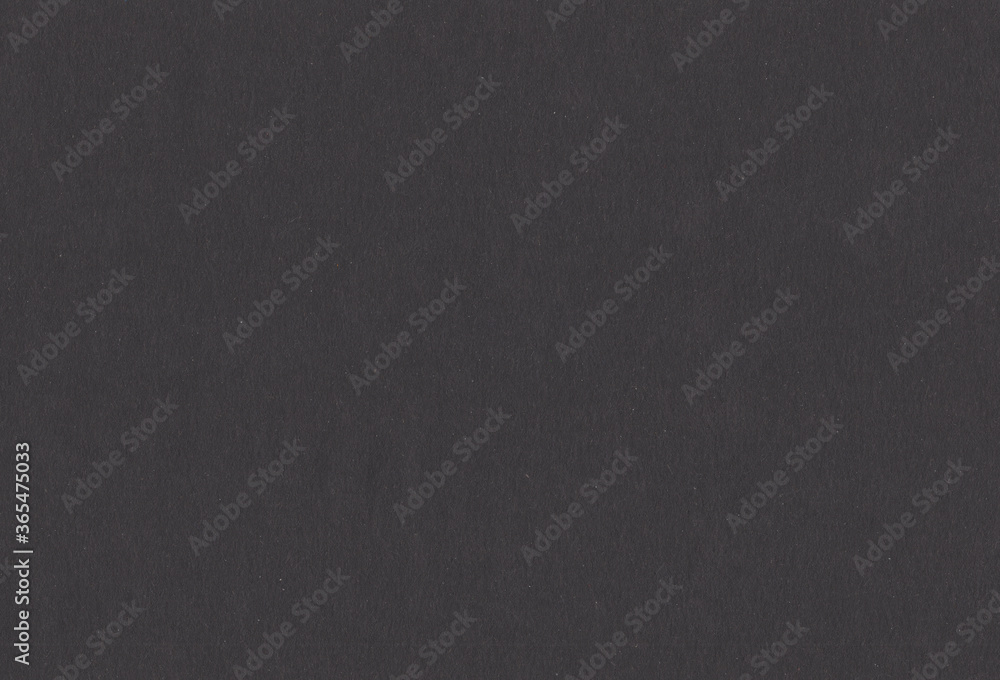 Black paper carton background with inclusions of recycled paper ...
