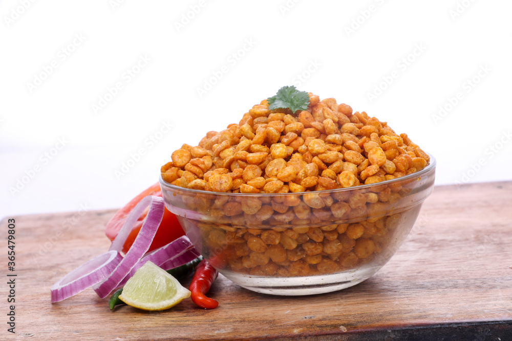 Fried Salted Chana Dal, Snacks for every occasion, Glass bowl on white ...
