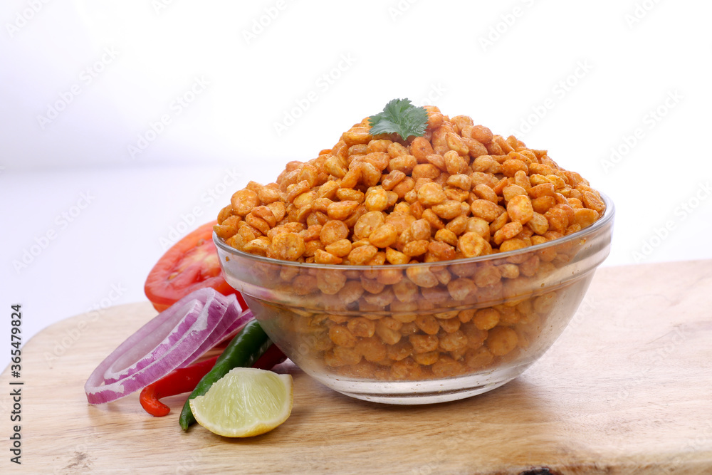 Fried Salted Chana Dal, Snacks for every occasion, Glass bowl on white ...