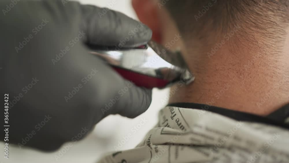 Close up electric trimmer shaver shaving asian male customer, Asian ...