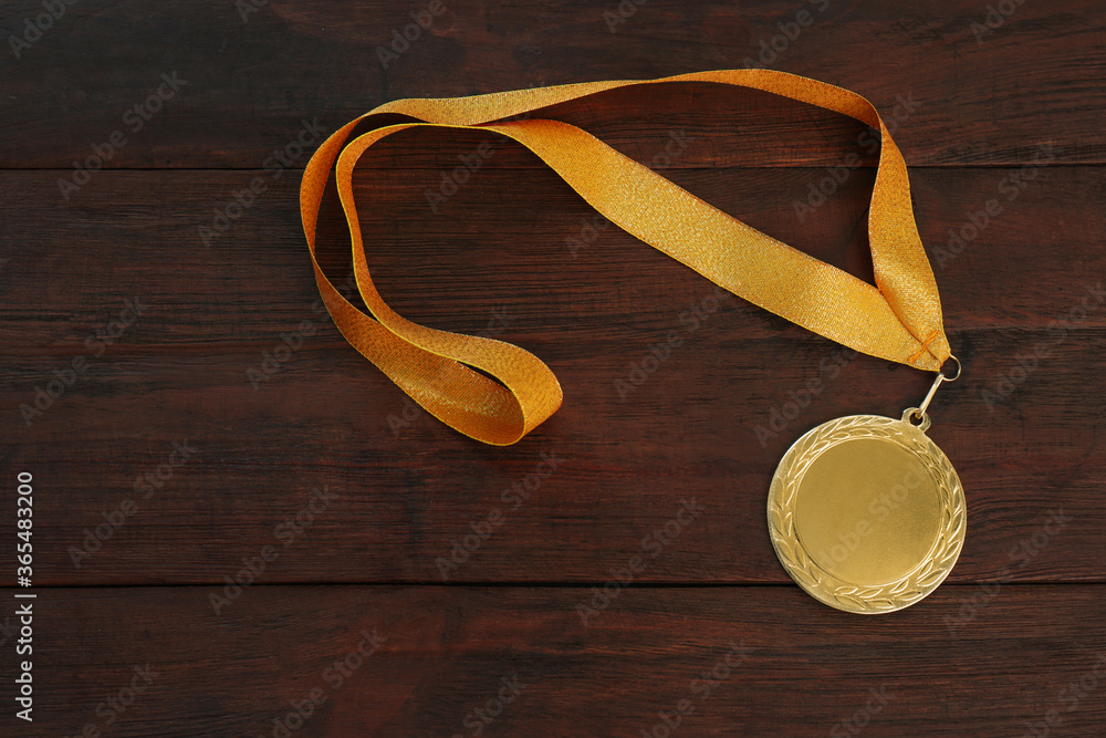 Gold medal on wooden background, top view. Space for design Stock Photo ...