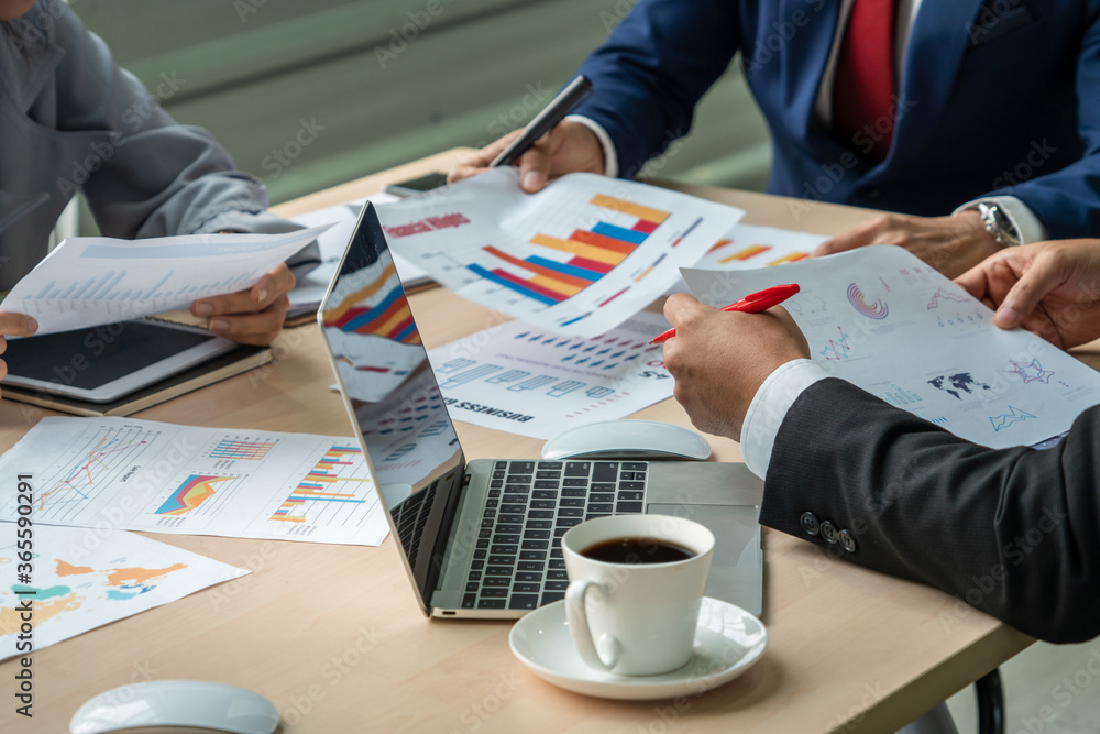 Smart businessman and businesswoman talking discussion in group meeting ...