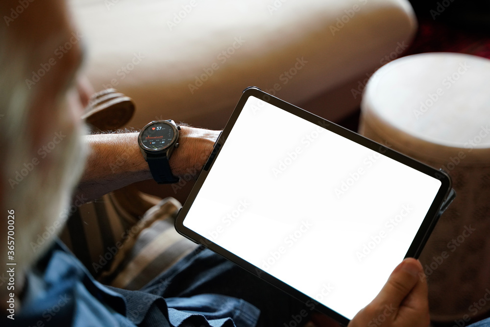 old man white hair with smart watch using pro tablet Stock Photo ...