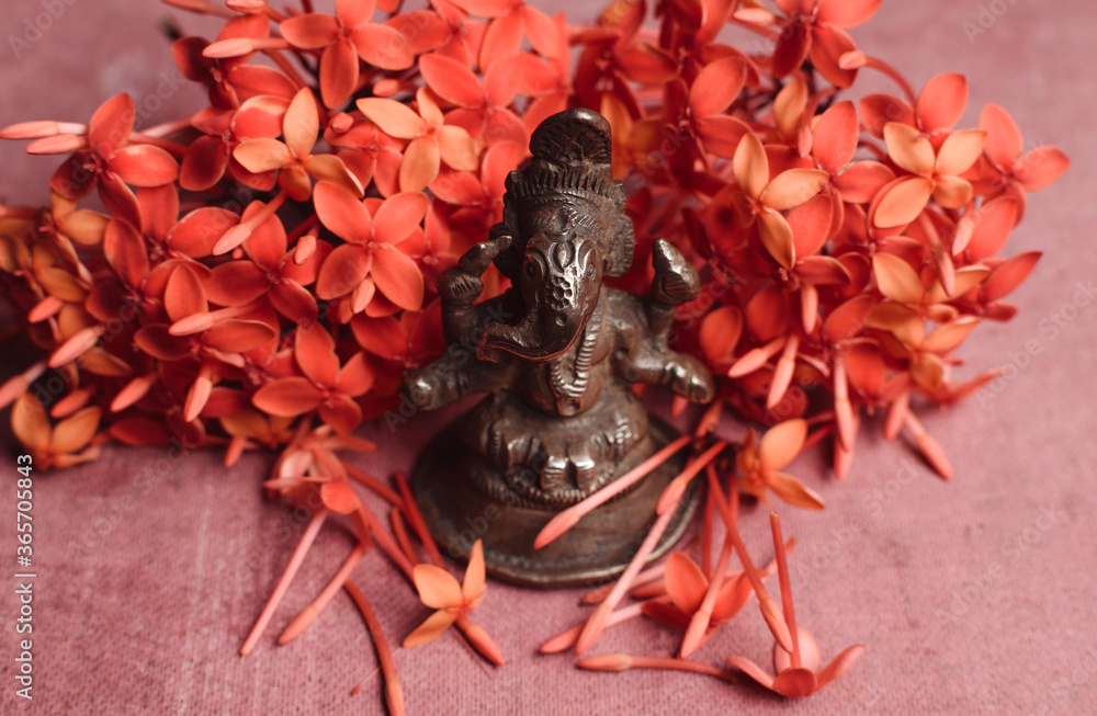Ganesha / Ganapathi idol decorated with flowers and interesting ...
