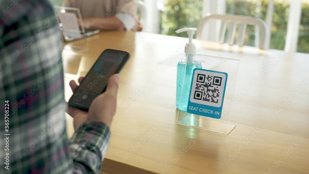 Asian man qr scan seat check in and hand sanitizer before start work at ...