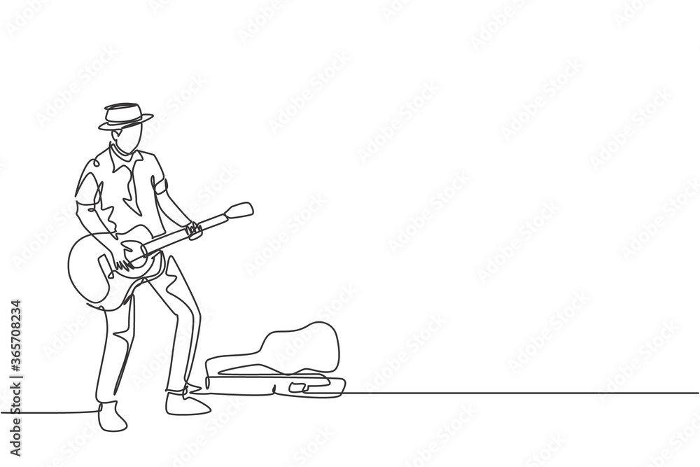 One continuous line drawing of young happy male guitarist standing and ...